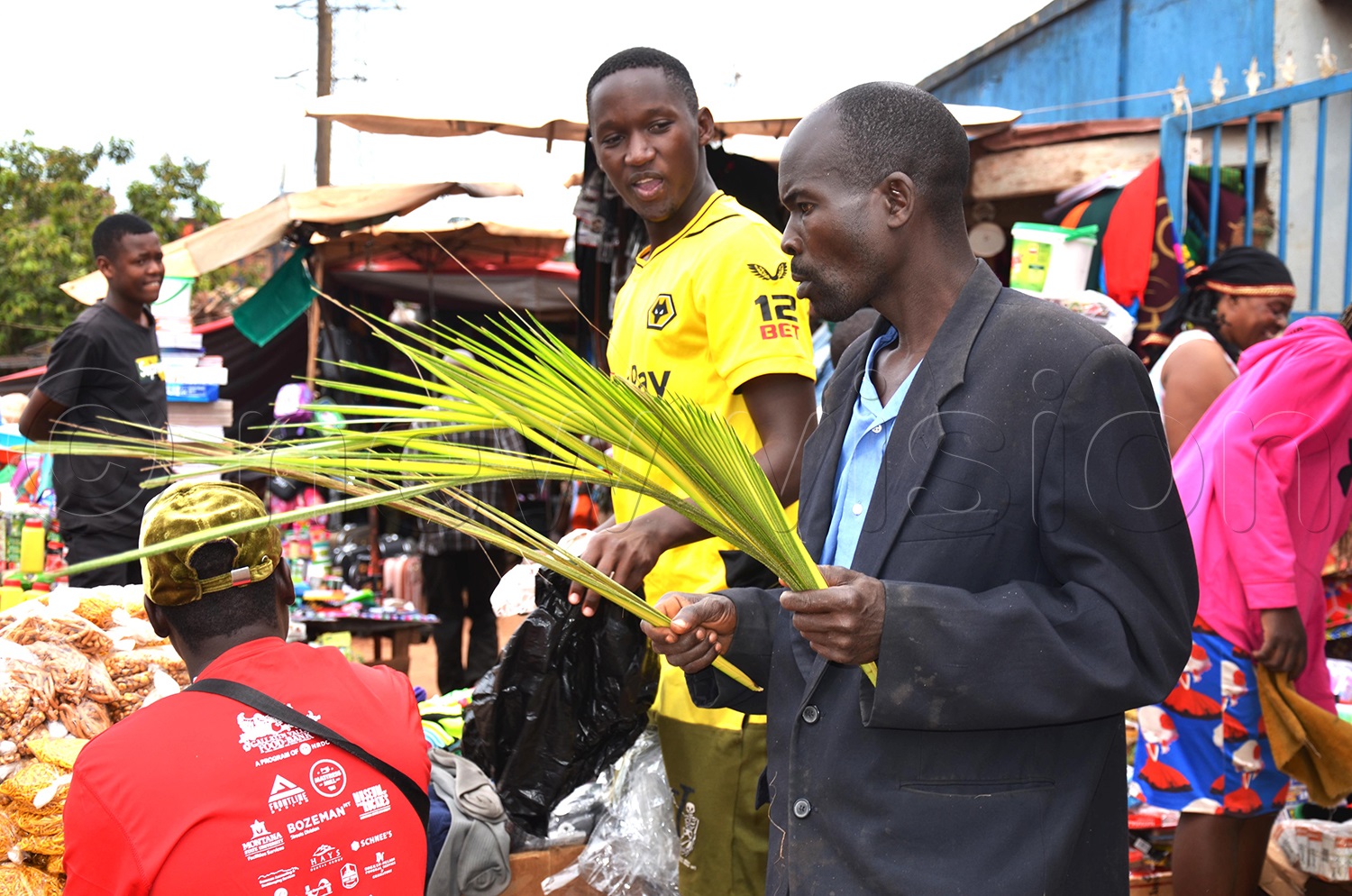 In pictures: Kampala hawkers busy as Christians brace for Palm Sunday ...
