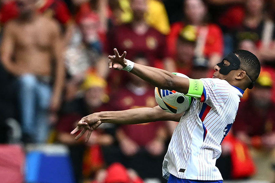 Sports: Masked man: Will Mbappe finally fire for France at E