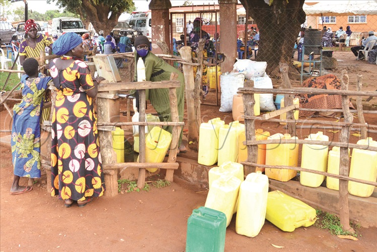 Patients paying for water at Yumbe health centre