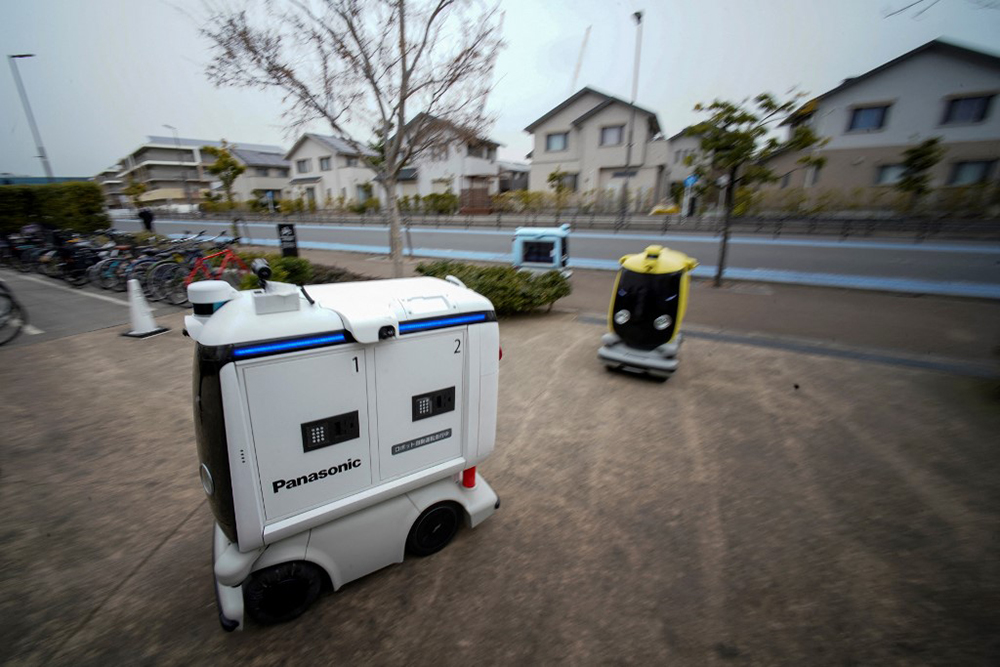 Japan rolls out 'humble, lovable' delivery robots - New Vision Official