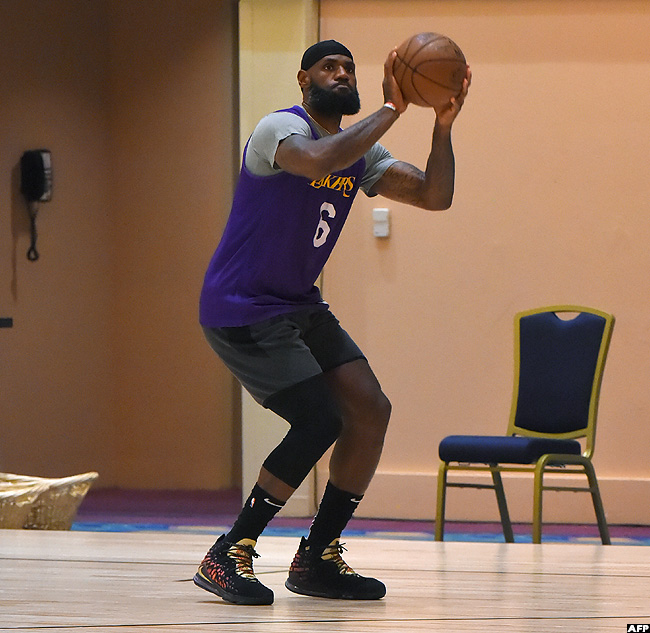 Sports: James working 'around the clock' to return for Laker