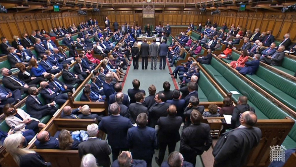 World: Nearly 100 Tory MPs rebel against Johnson's new virus
