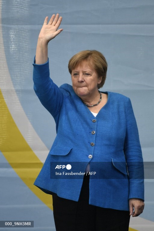 World: 'Eternal' chancellor: Germany's Merkel set to hand of