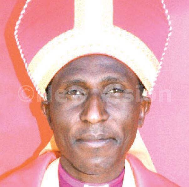 Bishop Kisembo asks colleagues to go and dig